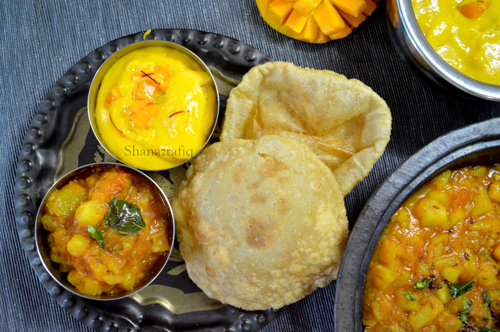 Aam Ras Puri and Aloo Bhaji (Puri, Mango Puree and Potato Curry)